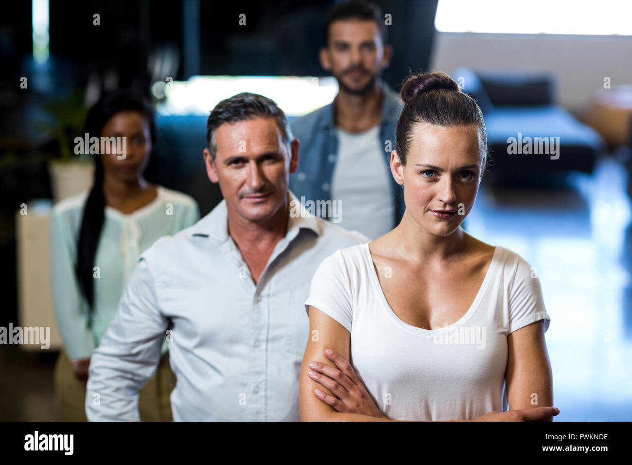 Team of colleagues posing together Stock Photo - Alamy