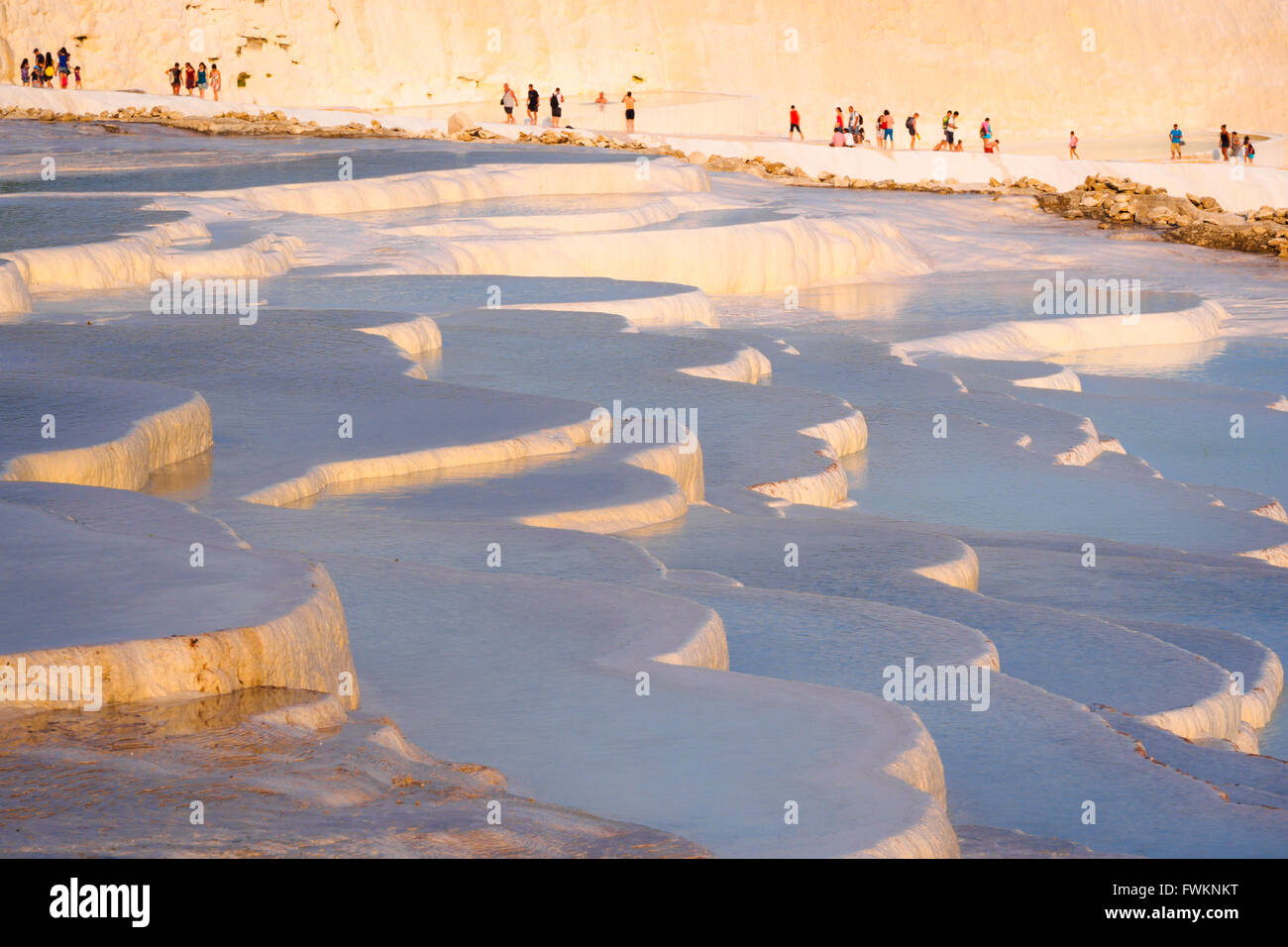 Evening light on the travertine pools at Pamukkale, Turkey Stock Photo ...