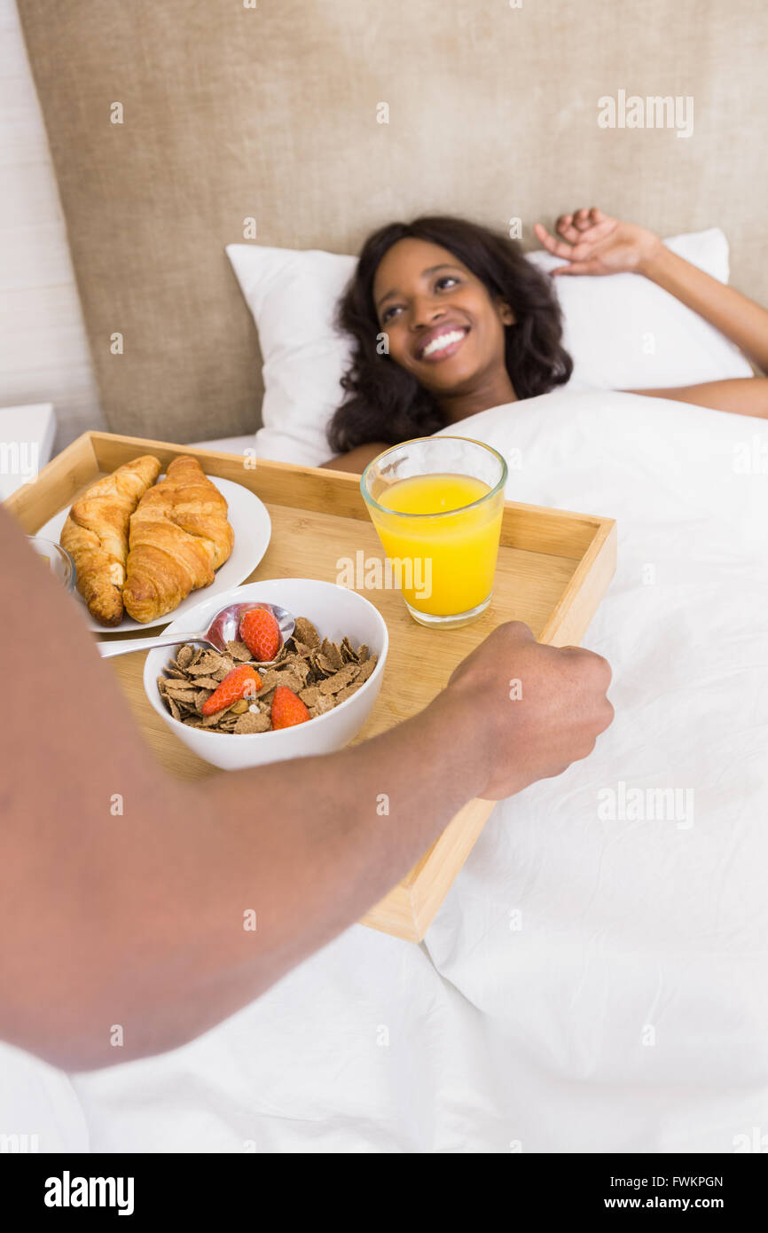 Man serving breakfast to woman Stock Photo - Alamy