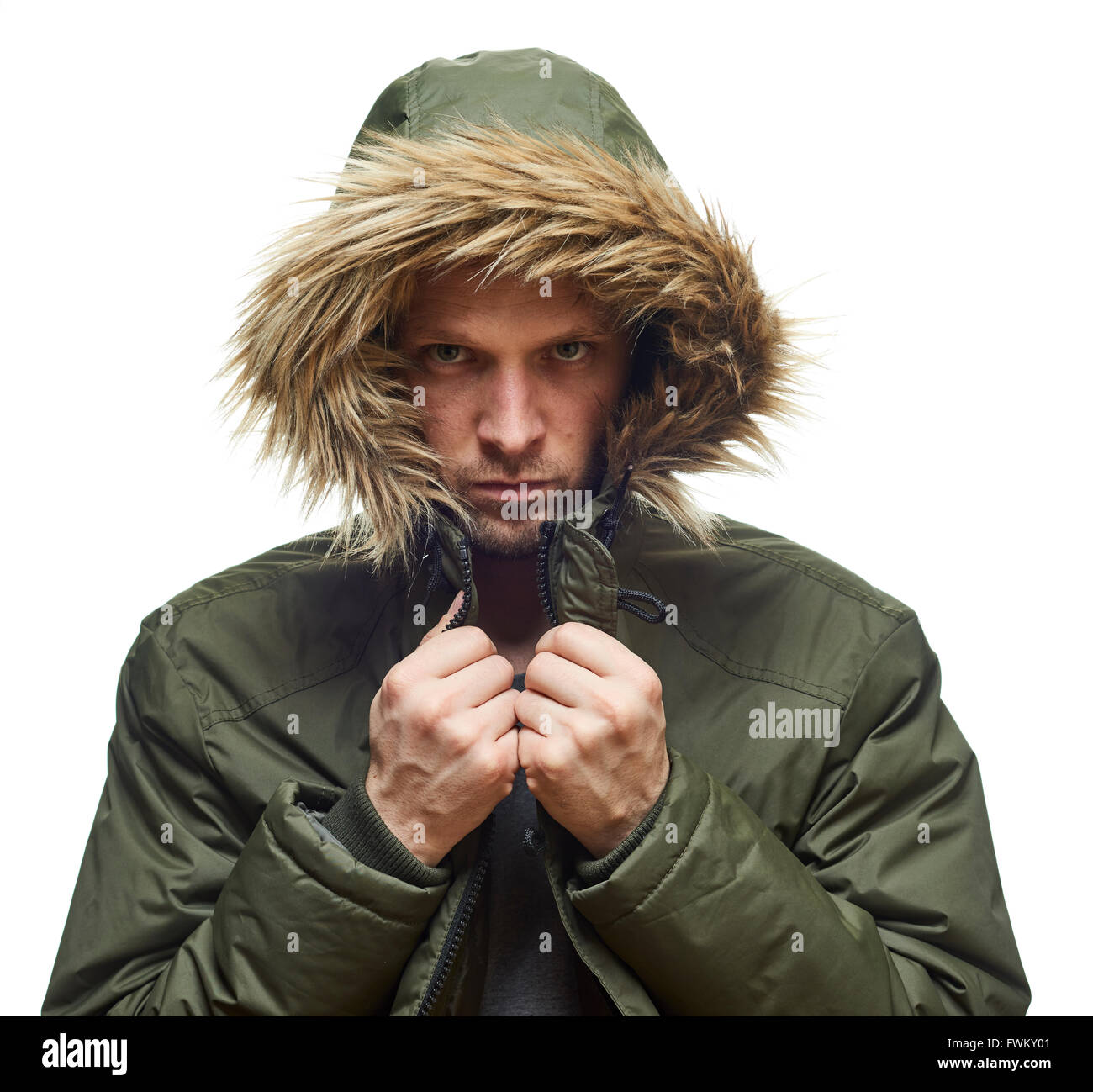High key studio portrait of young adult caucasian model wearing winter ...