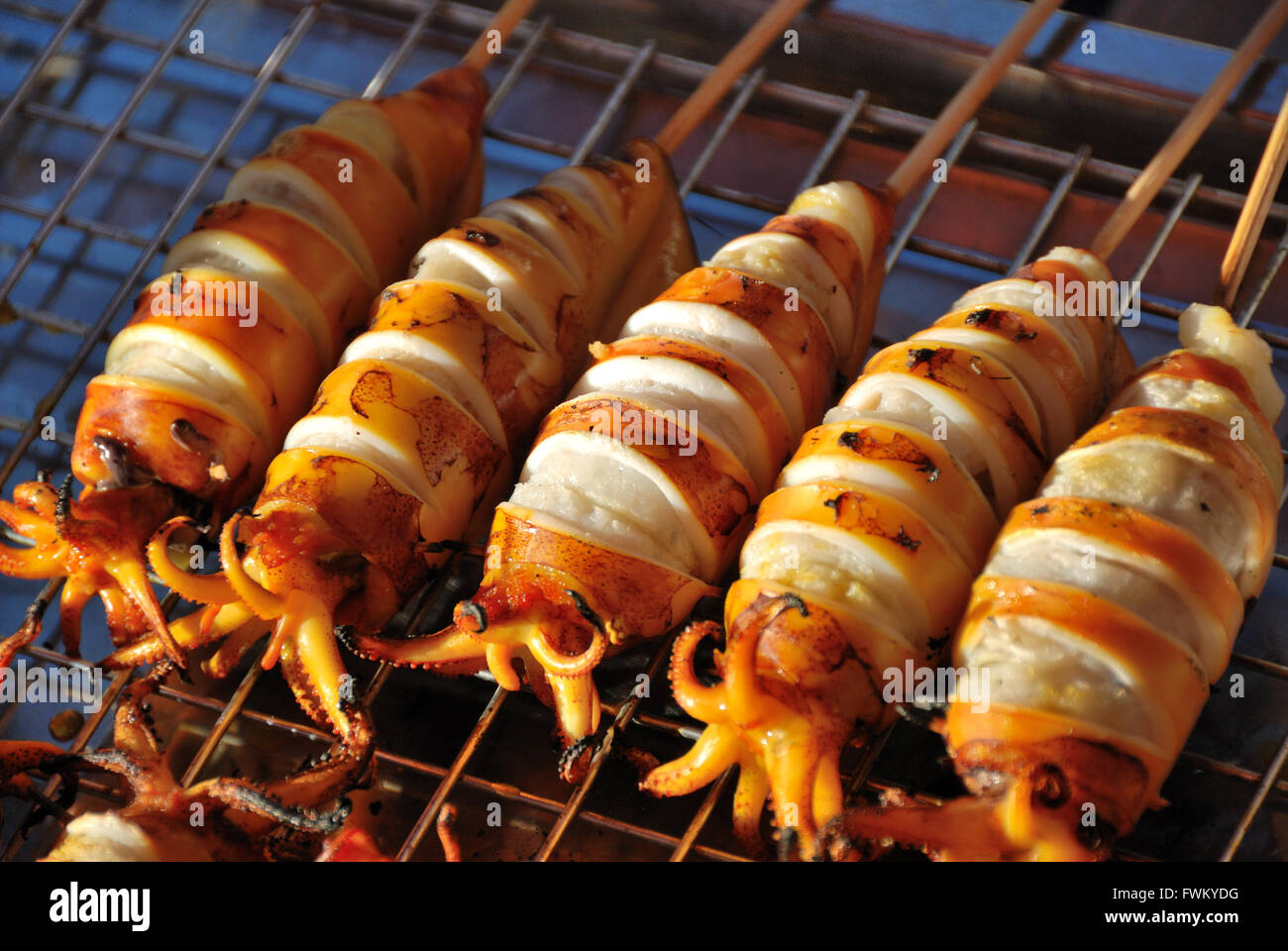 Food cooking on grill hi-res stock photography and images - Alamy