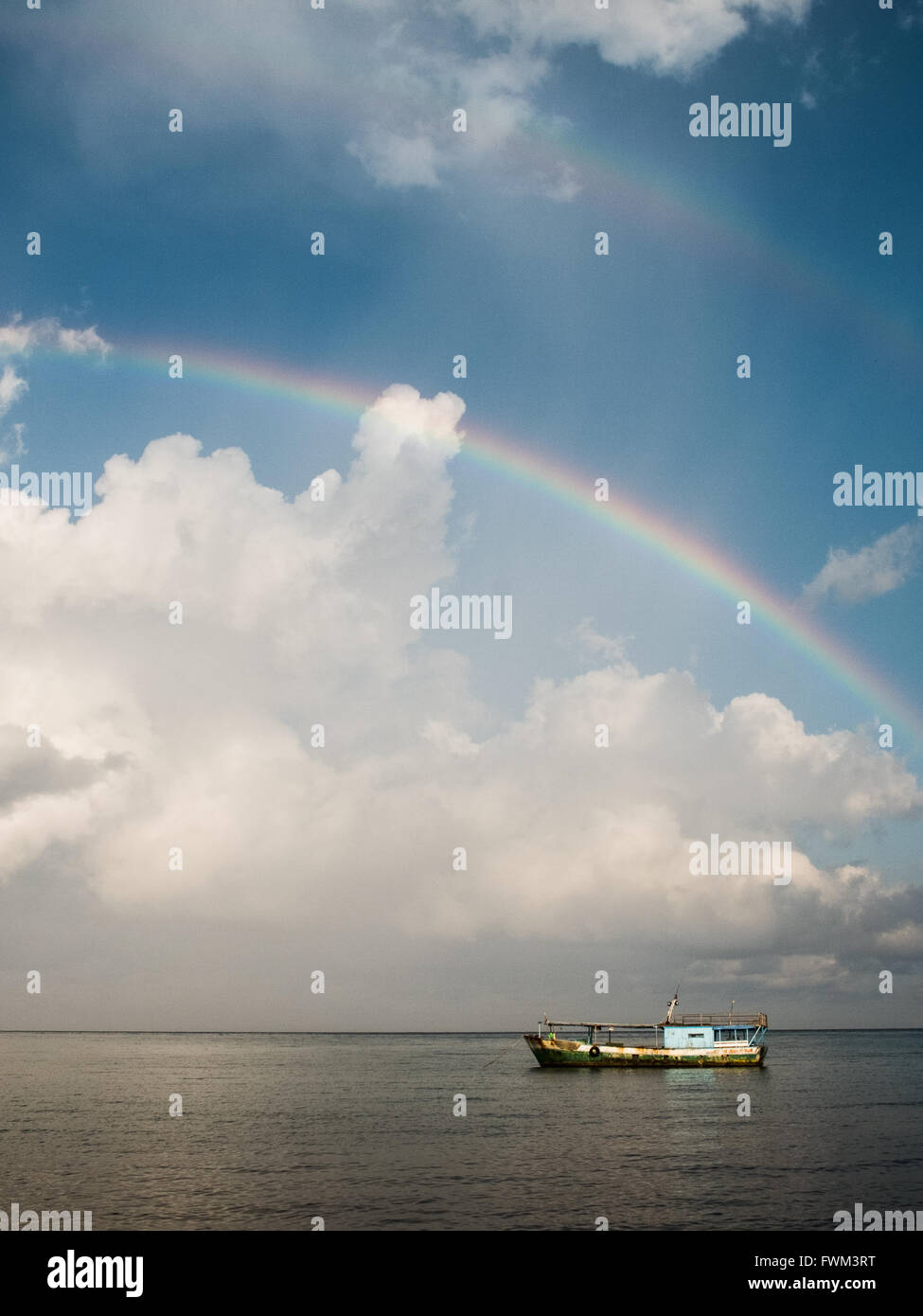 Rainbow over boat hi-res stock photography and images - Alamy