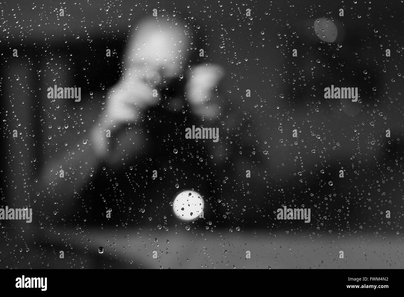 Man through glass hi-res stock photography and images - Alamy