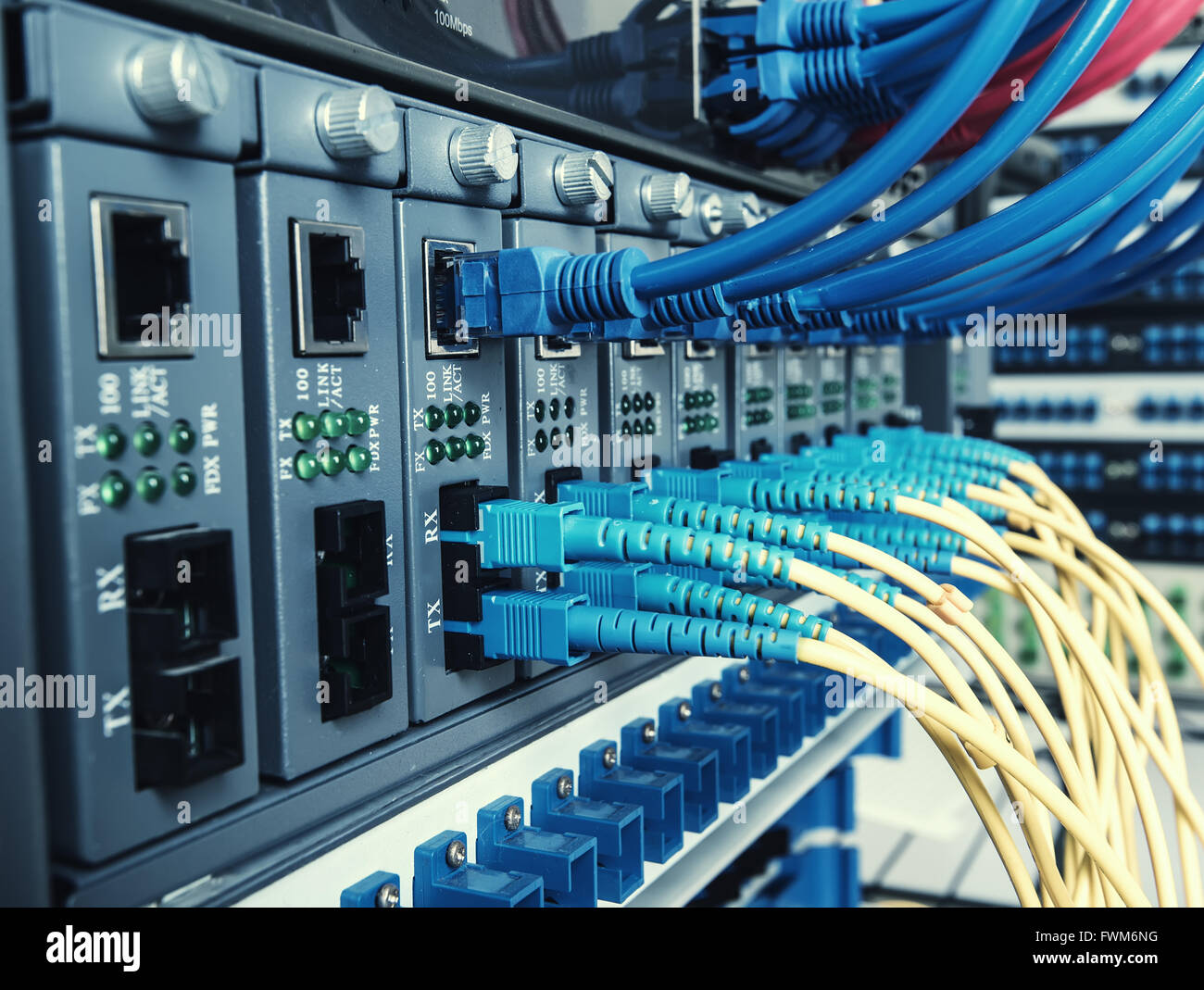 Fiber optic connecting on core network swtich Stock Photo - Alamy