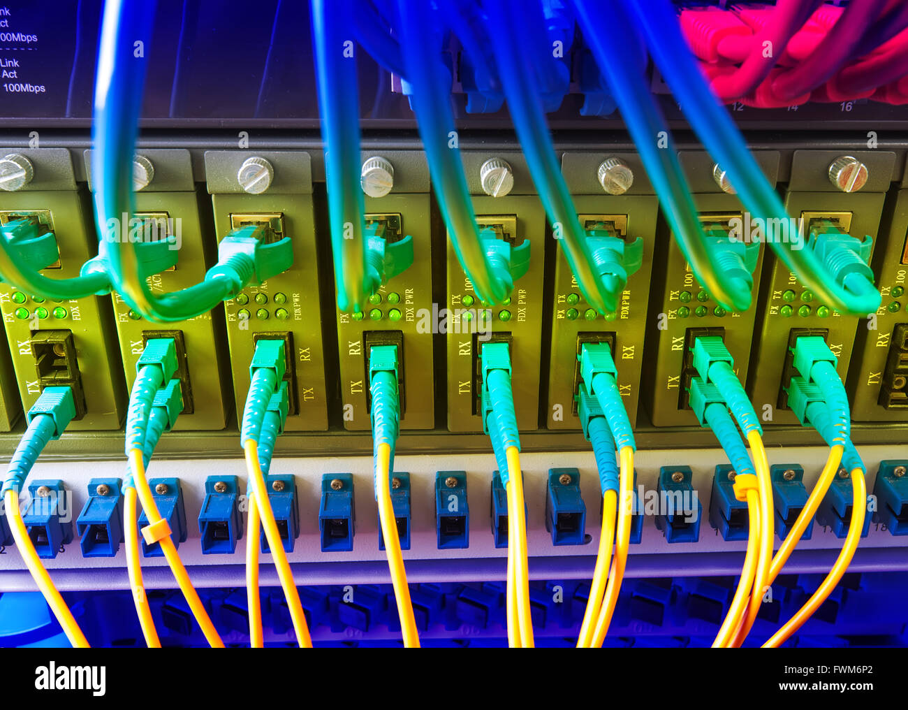 Fiber optic connecting on core network swtich Stock Photo - Alamy