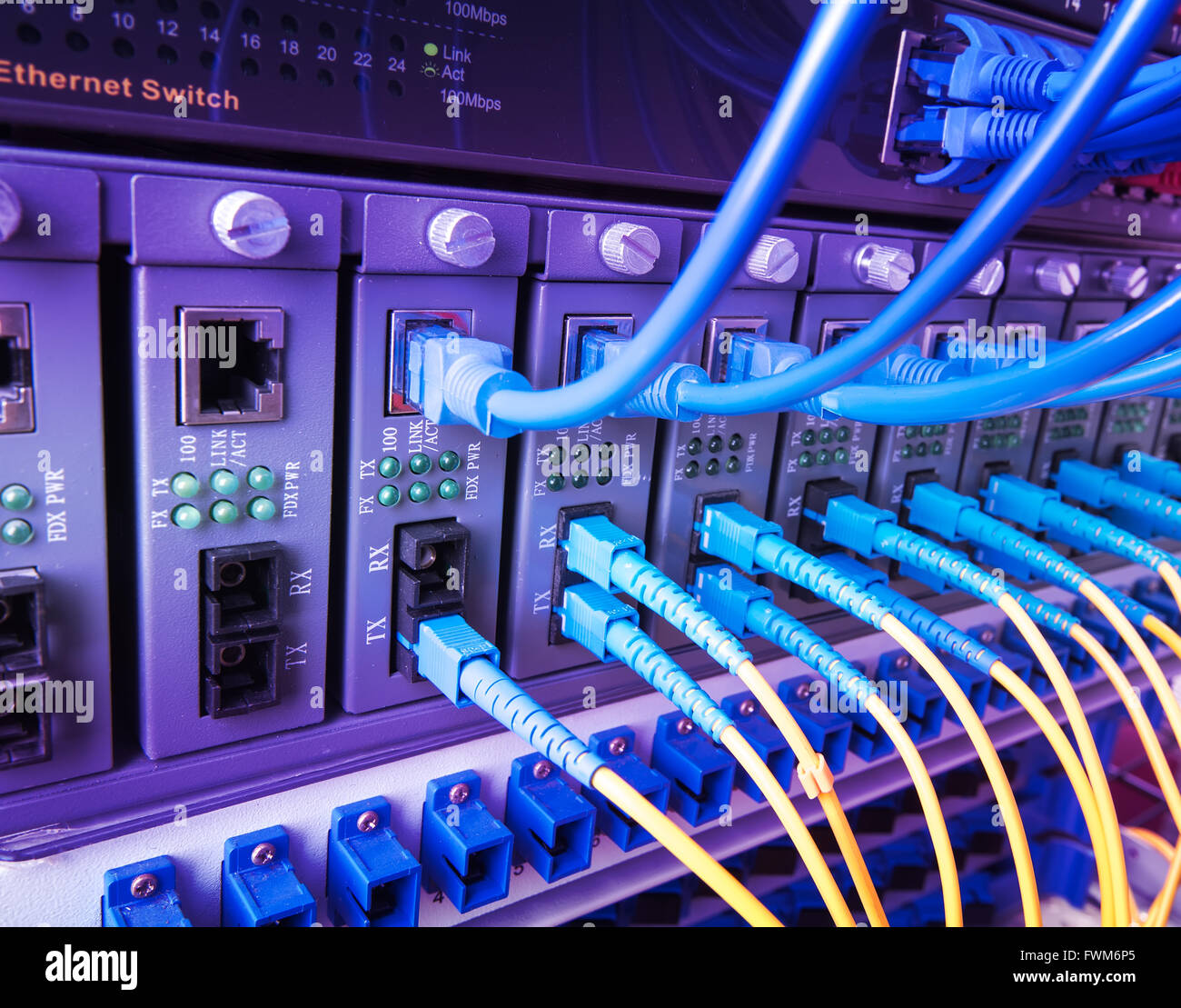Fiber optic connecting on core network swtich Stock Photo - Alamy