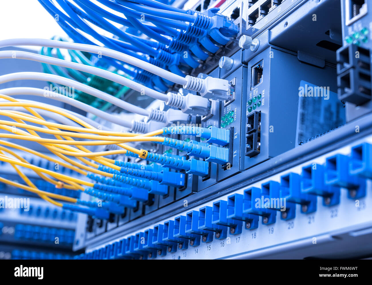 Fiber optic connecting on core network swtich Stock Photo - Alamy