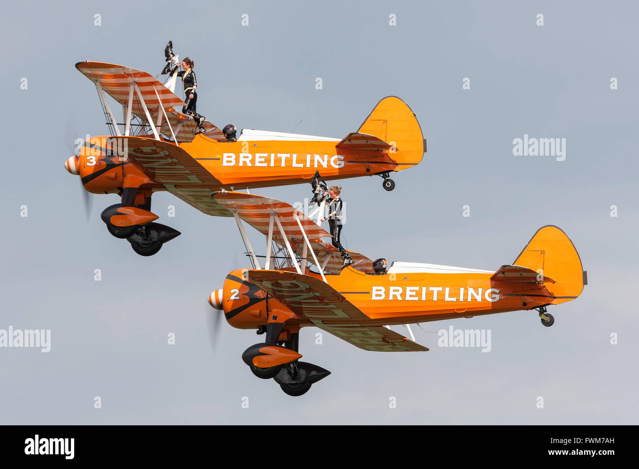 Breitling Wing Walkers in their distinctive orange Boeing Stearman ...