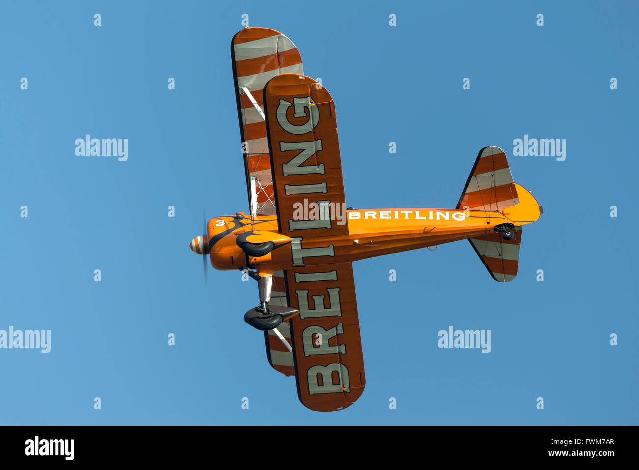 Breitling Wing Walkers in their distinctive orange Boeing Stearman ...