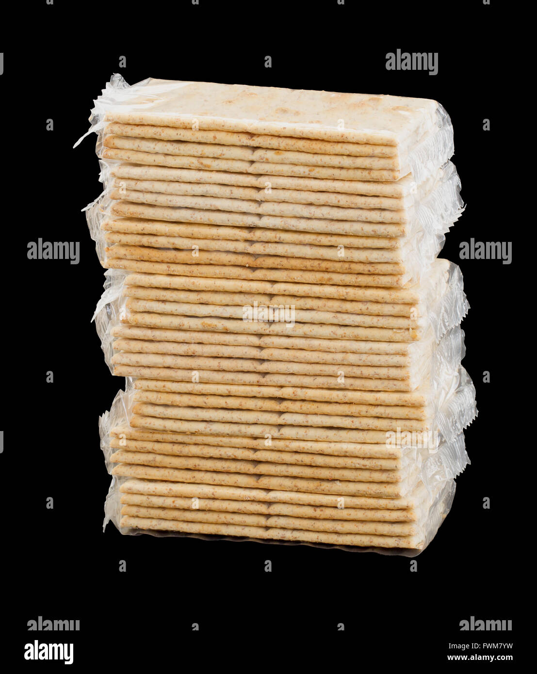 Crackers in plastic, isolated on a black background Stock Photo - Alamy