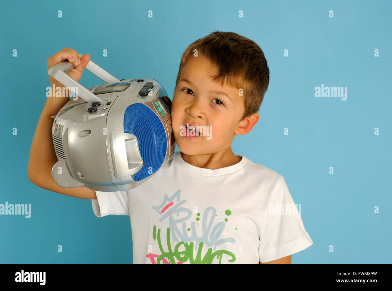 Child is listening to the radio hi-res stock photography and images - Alamy