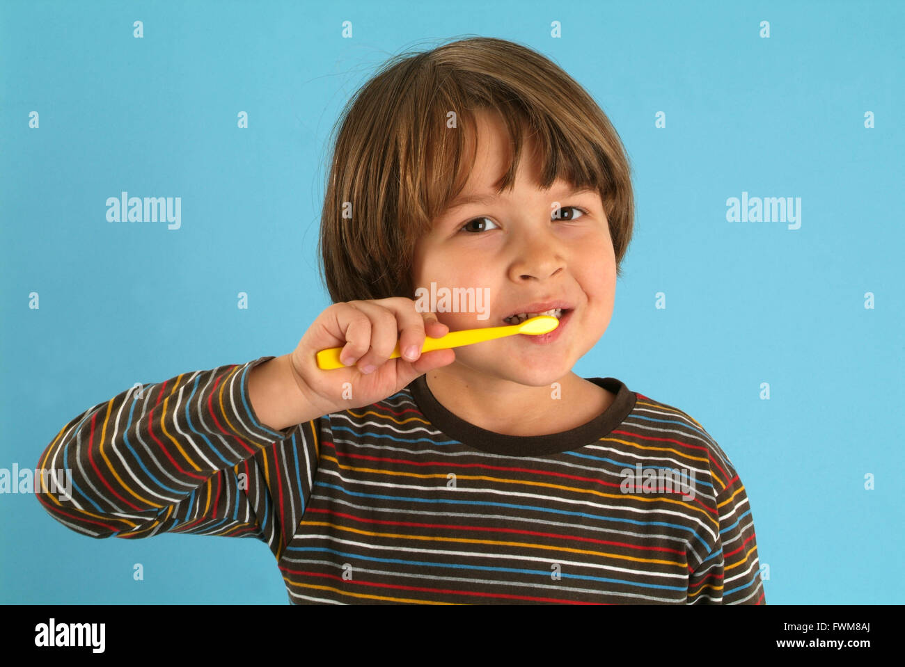 Boy brushing his teeth Stock Photo - Alamy