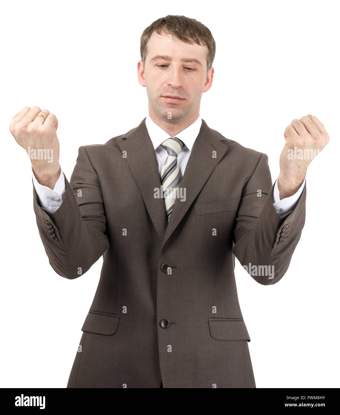 Businessman raised his hands up in front of him Stock Photo - Alamy