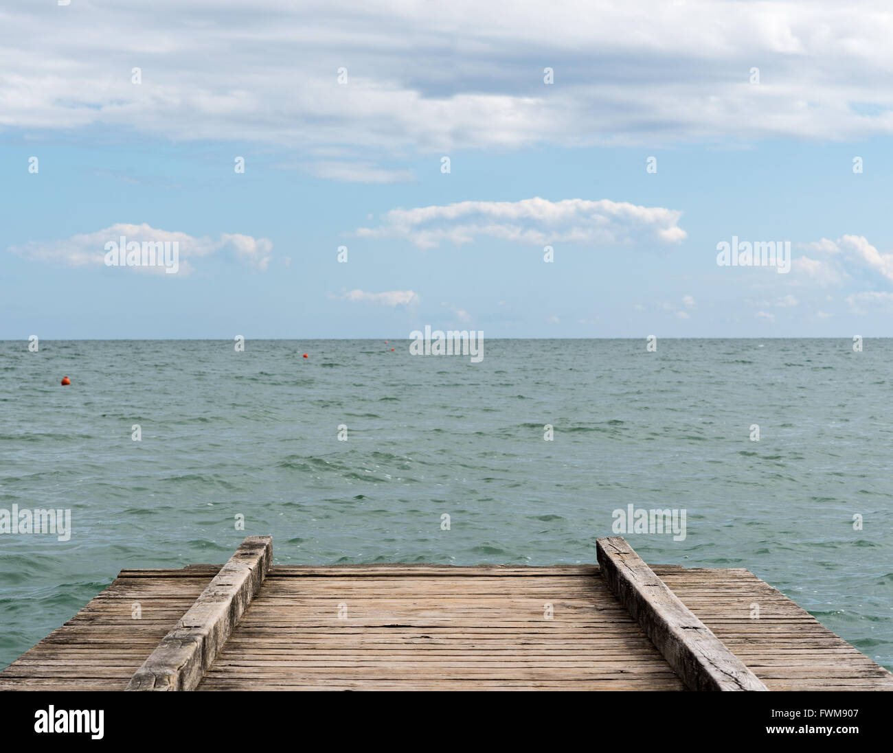 Sea view with quay Stock Photo - Alamy