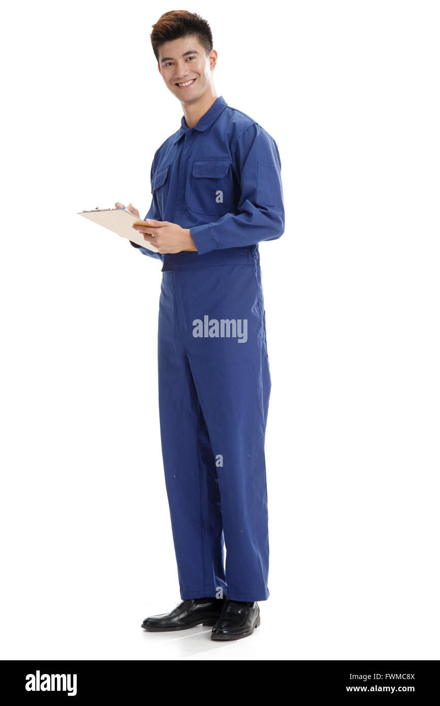 Man in overalls standing Cut Out Stock Images & Pictures - Alamy