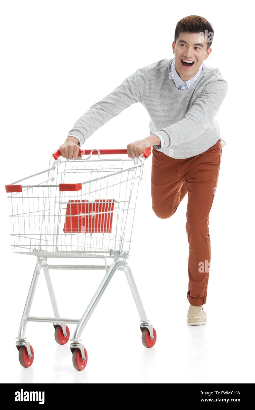 Man running shopping cart in hi-res stock photography and images - Alamy