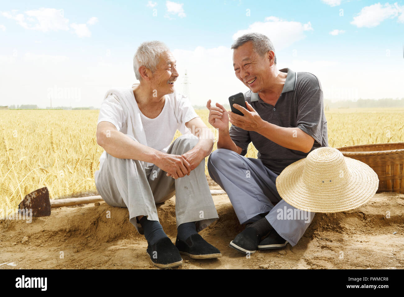 Farmers talking in field hi-res stock photography and images - Alamy