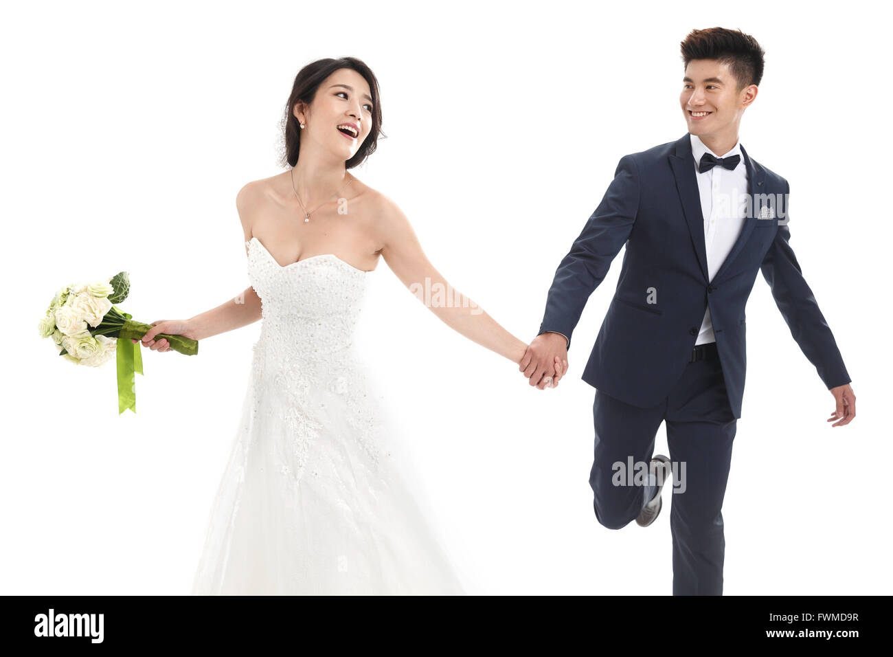 Groom chasing bride hi-res stock photography and images - Alamy