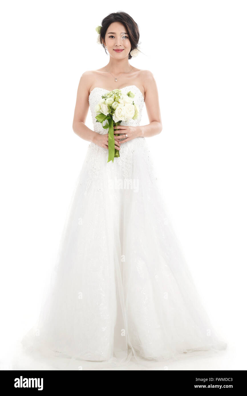 Bride holding bouquet Stock Photo - Alamy