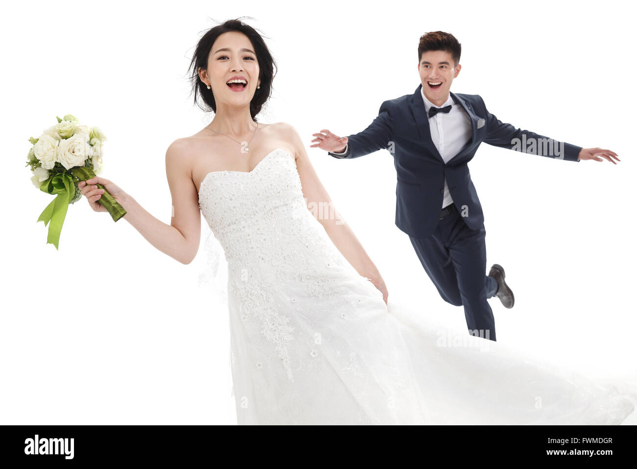 Groom chasing bride hi-res stock photography and images - Alamy