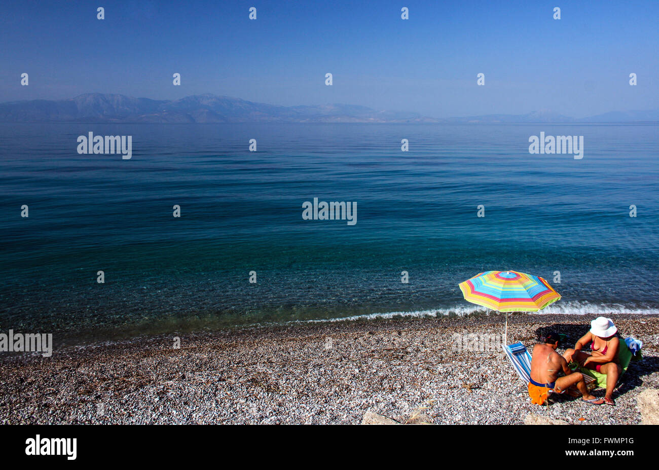 relaxing on the beach Stock Photo - Alamy
