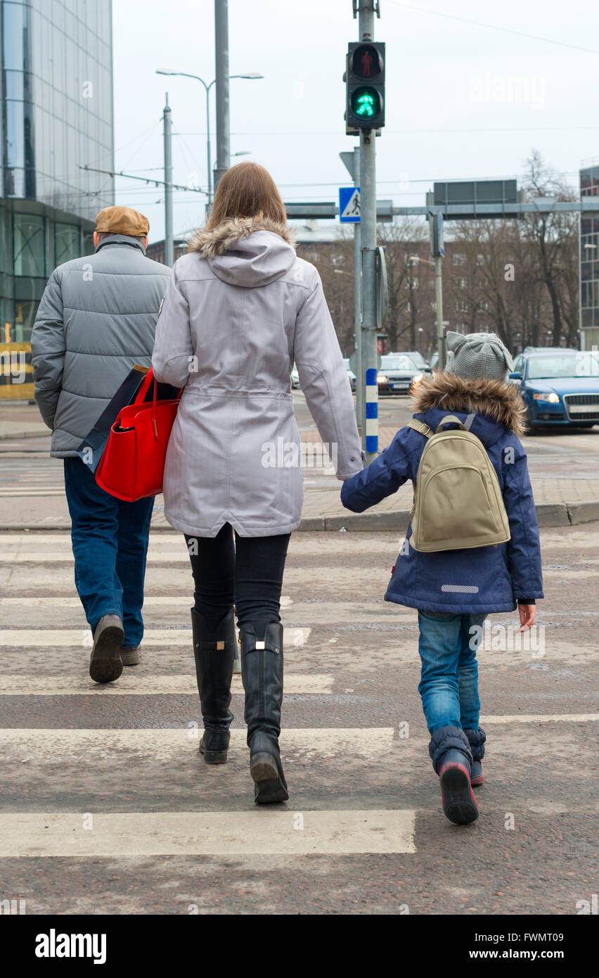 Child crossing road green traffic light hi-res stock photography and ...