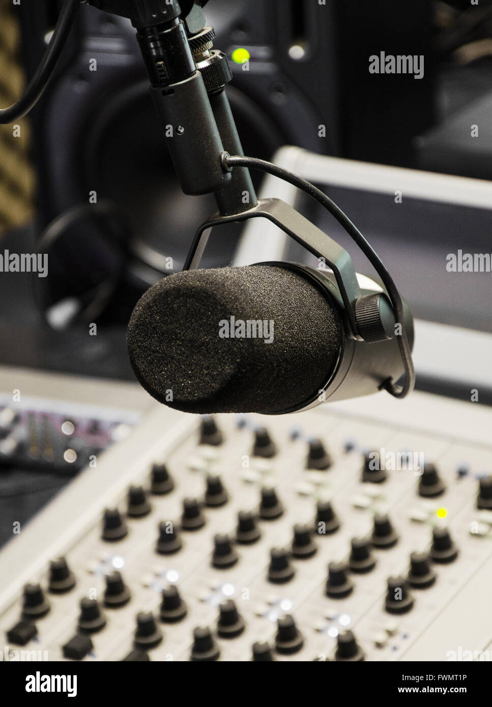 Microphone and mixing panel in radio studio Stock Photo - Alamy