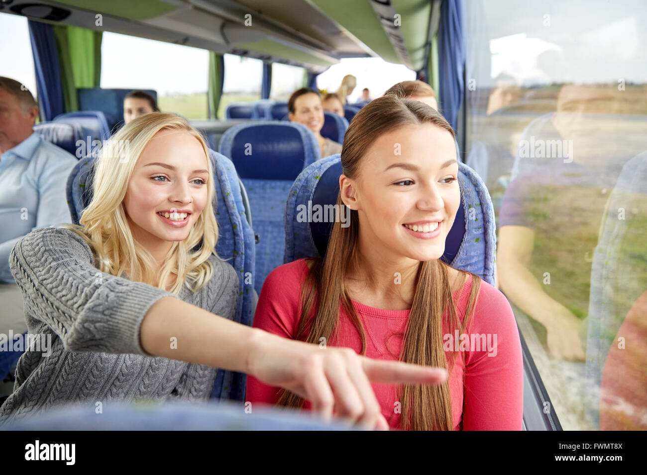 Woman riding bus hi-res stock photography and images - Alamy