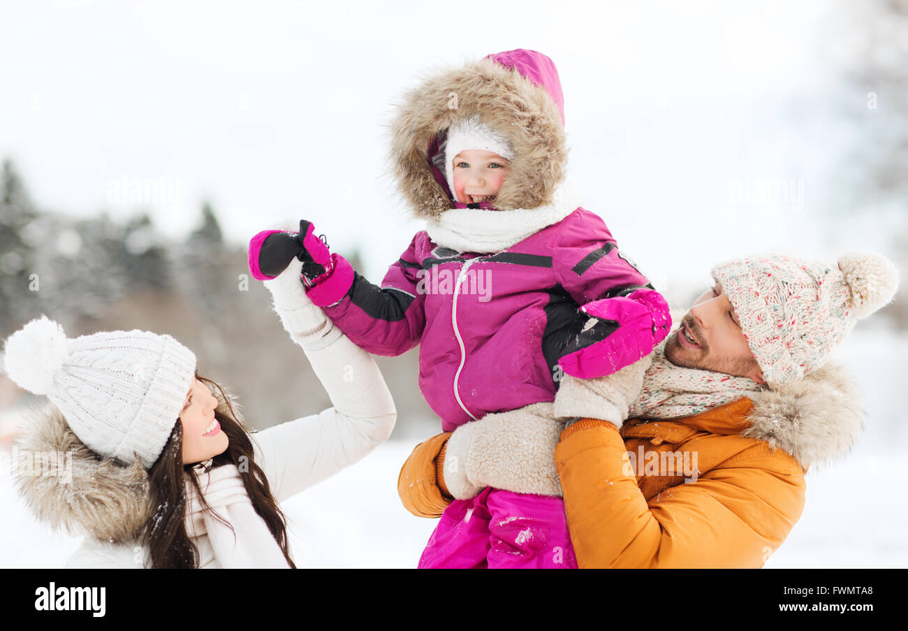 happy family with child in winter clothes outdoors Stock Photo - Alamy