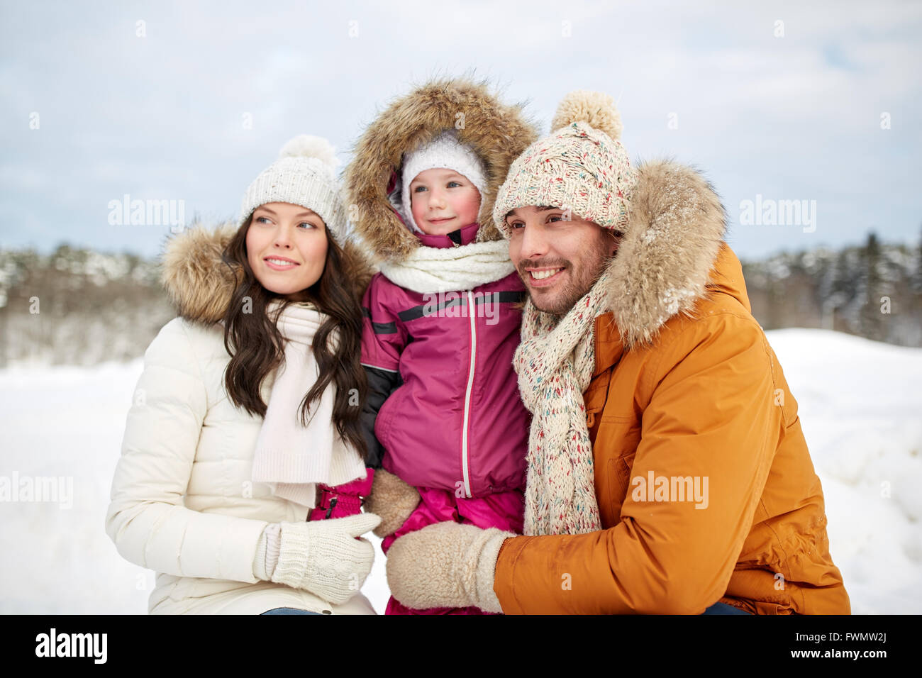happy family with child in winter clothes outdoors Stock Photo - Alamy