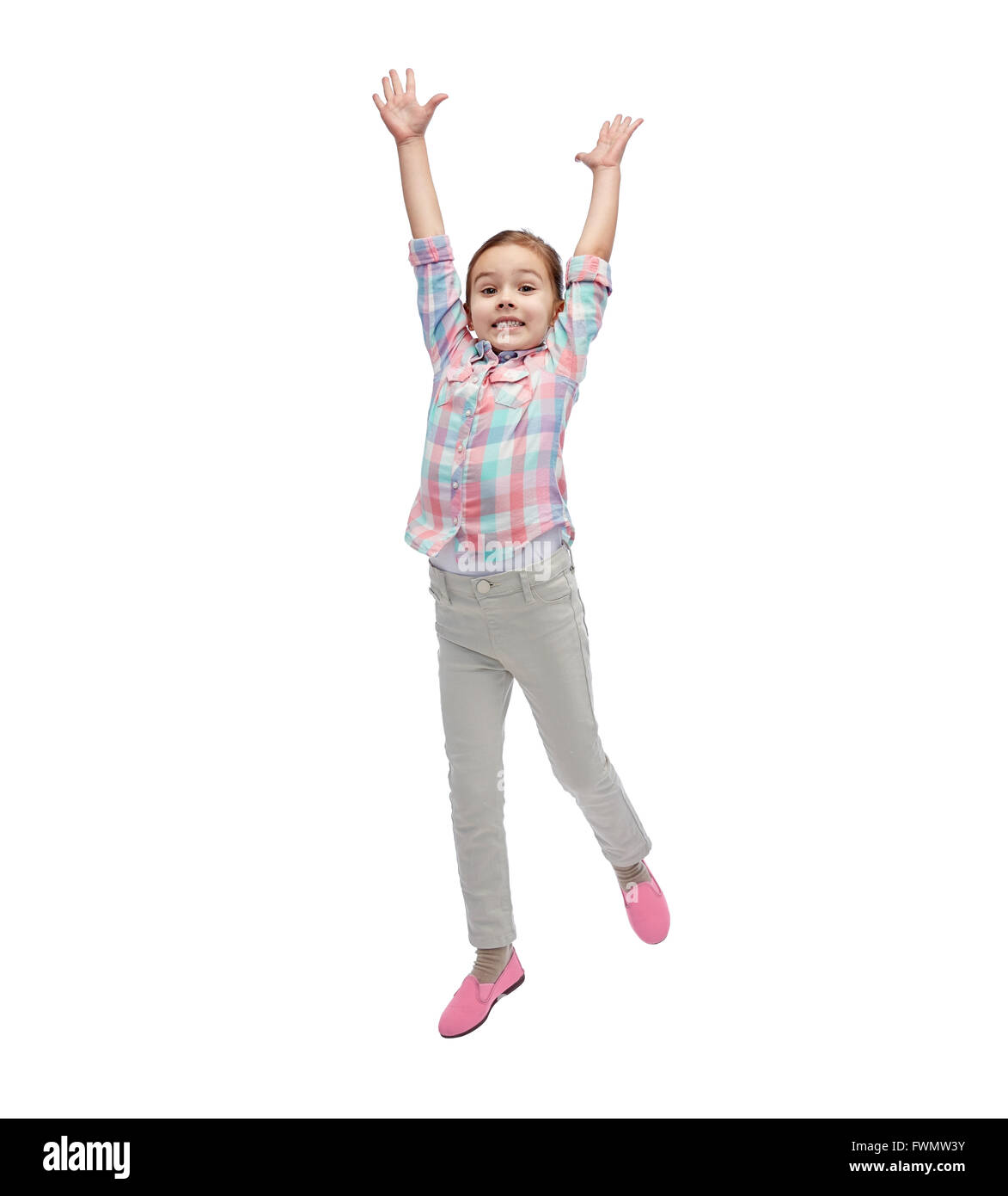 happy little girl jumping in air Stock Photo - Alamy