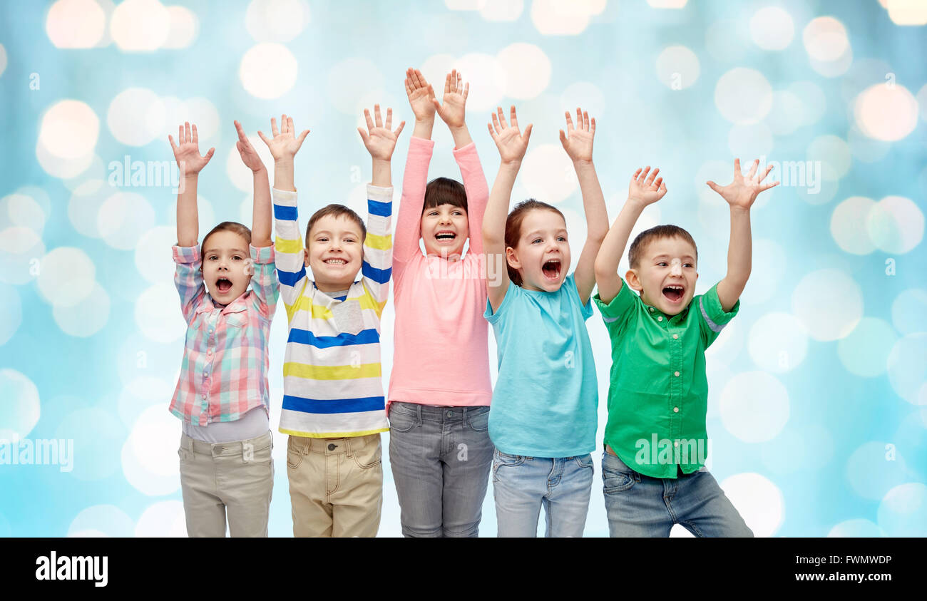 happy friends celebrating victory Stock Photo - Alamy