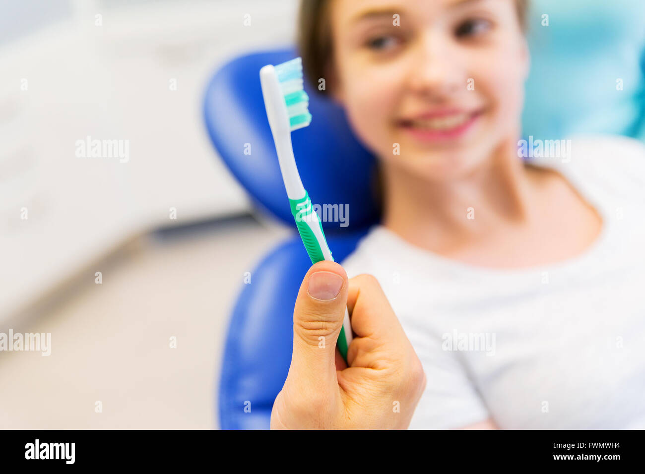 Dentist hand toothbrush hi-res stock photography and images - Alamy