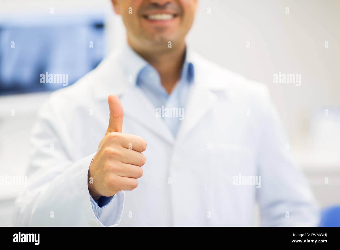 close up of doctor showing thumbs up at hospital Stock Photo - Alamy