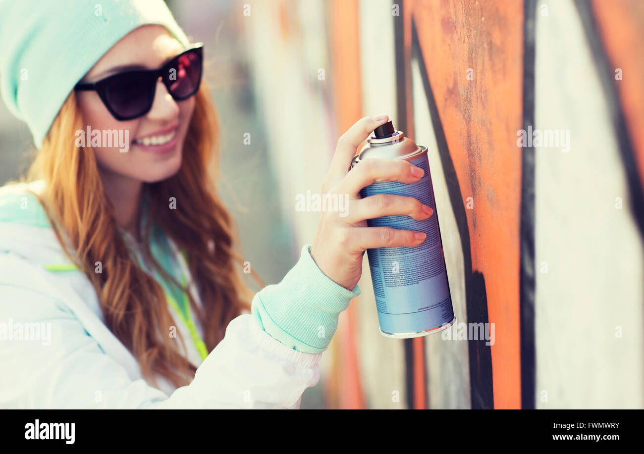 Woman Spray Paint High Resolution Stock Photography and Images - Alamy