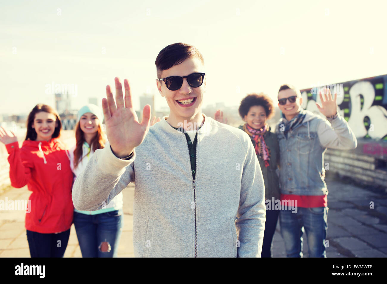 Waving hands student hi-res stock photography and images - Alamy