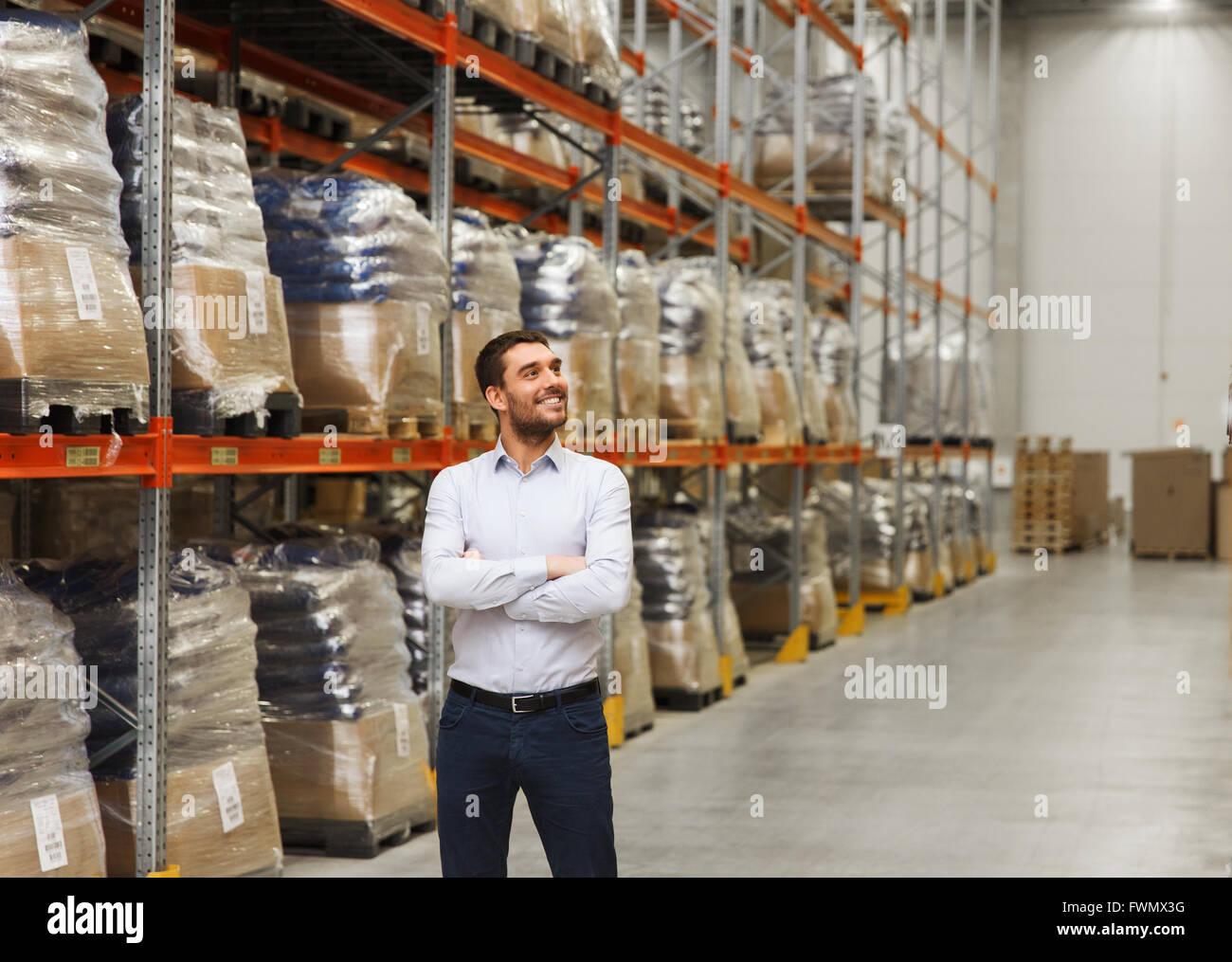 happy man at warehouse Stock Photo - Alamy