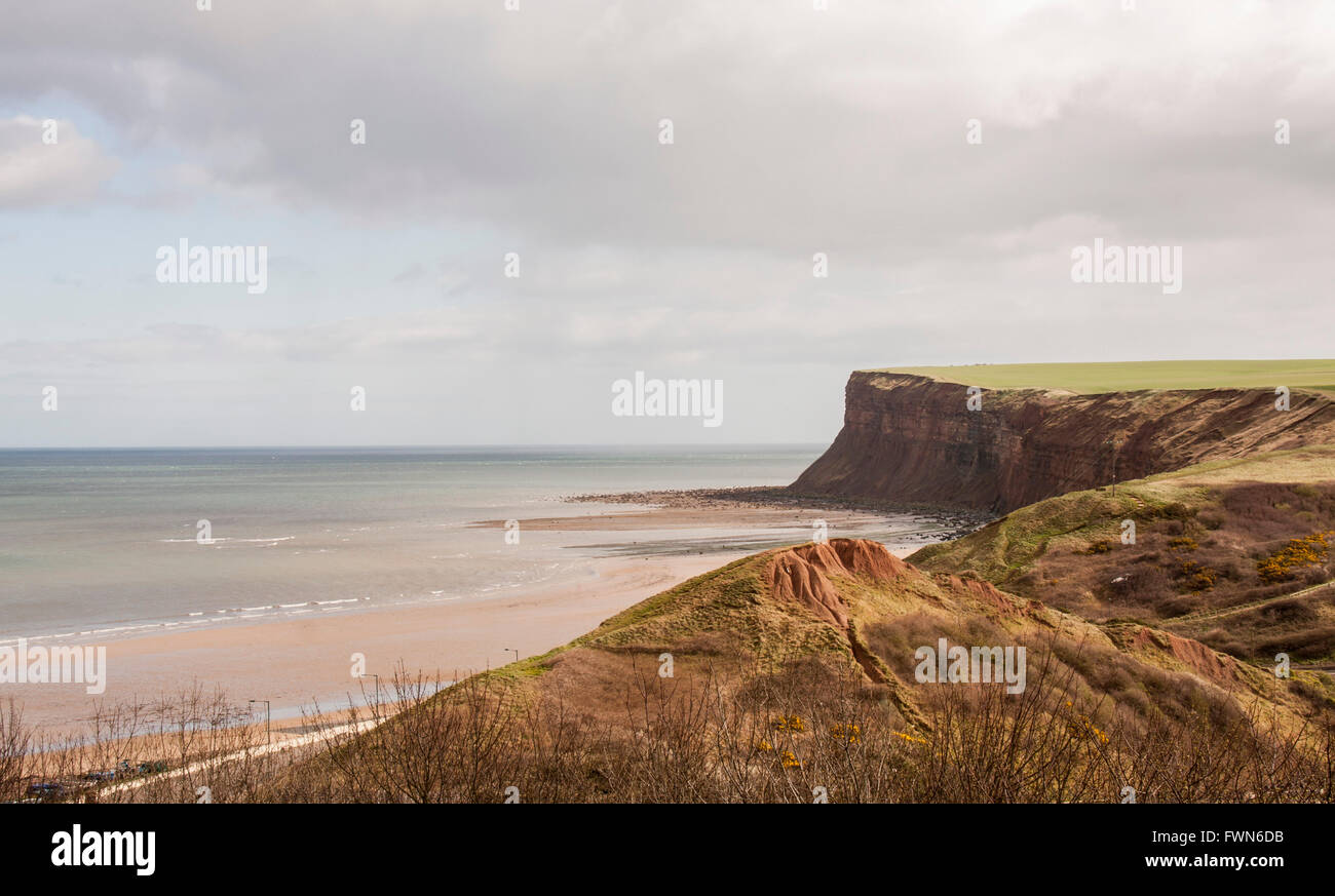A cliff top view of the beach and Huntcliff at Saltburn by the Sea ...