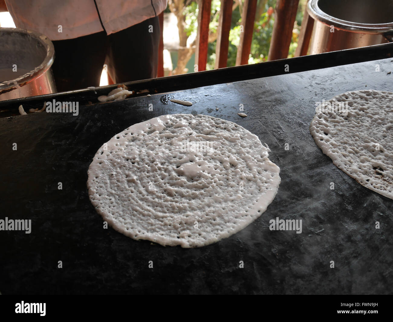 Indian Dosa being cooked Stock Photo - Alamy