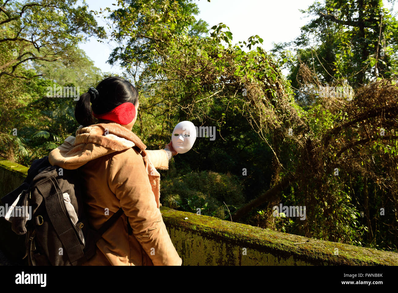 woman take a mask Stock Photo - Alamy