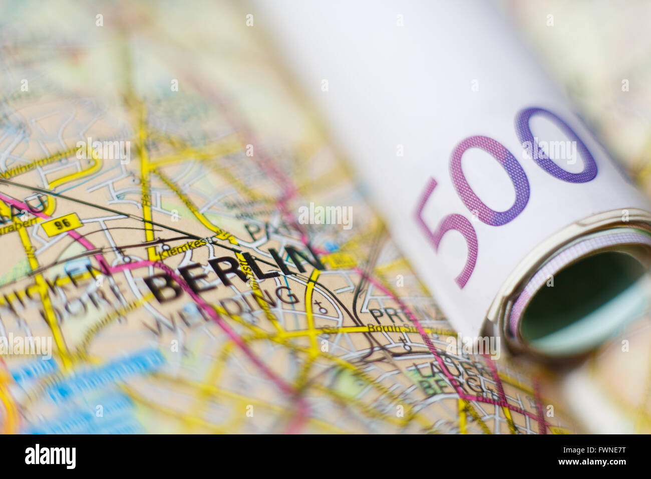 Euro banknotes on a geographical map of Berlin, Germany Stock Photo - Alamy