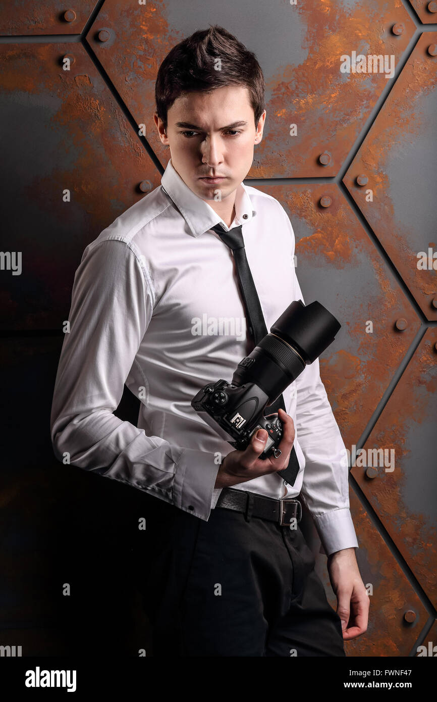 Man photographer in studio Stock Photo - Alamy