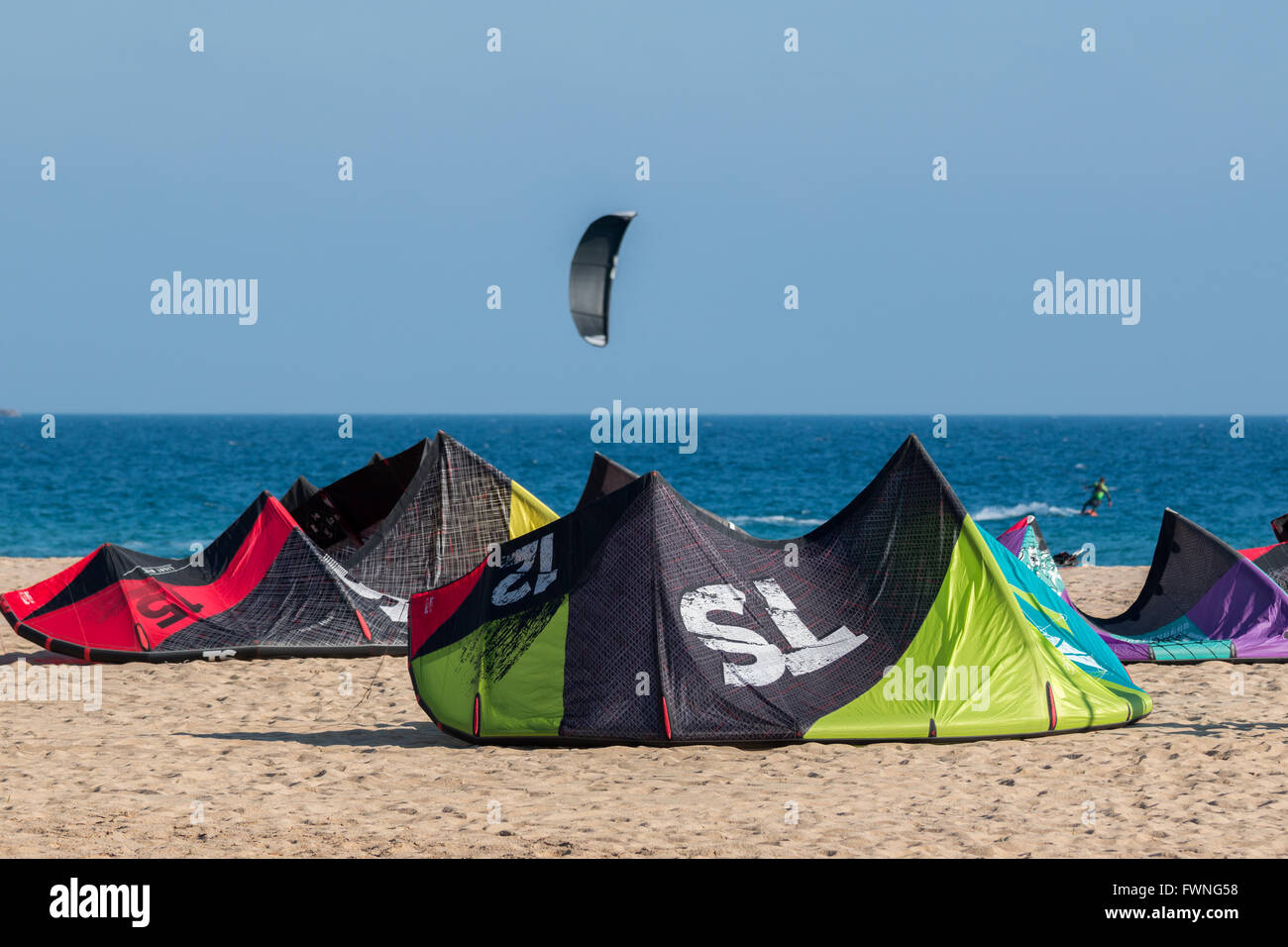 Kites is lying on the sand in Spain Stock Photo - Alamy