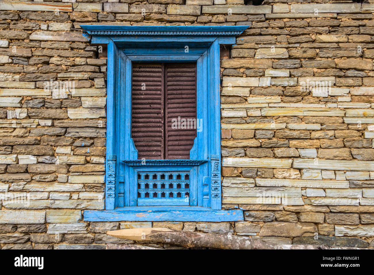 A traditional Nepalese window, blue frame and brown shutters Stock ...
