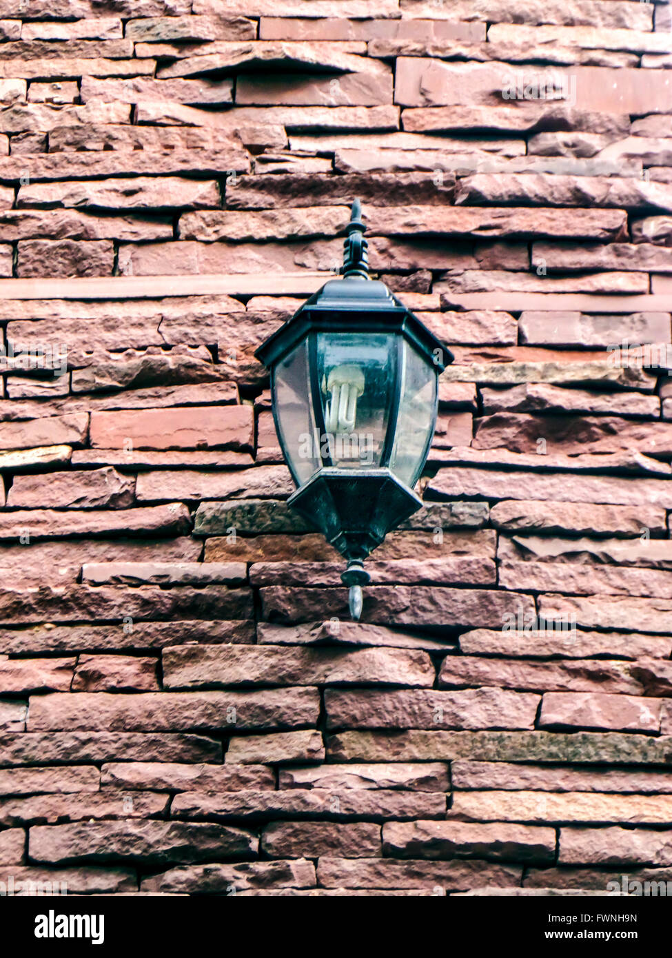 lamp on rock pieces texture and concrete wall outdoor home Stock Photo ...