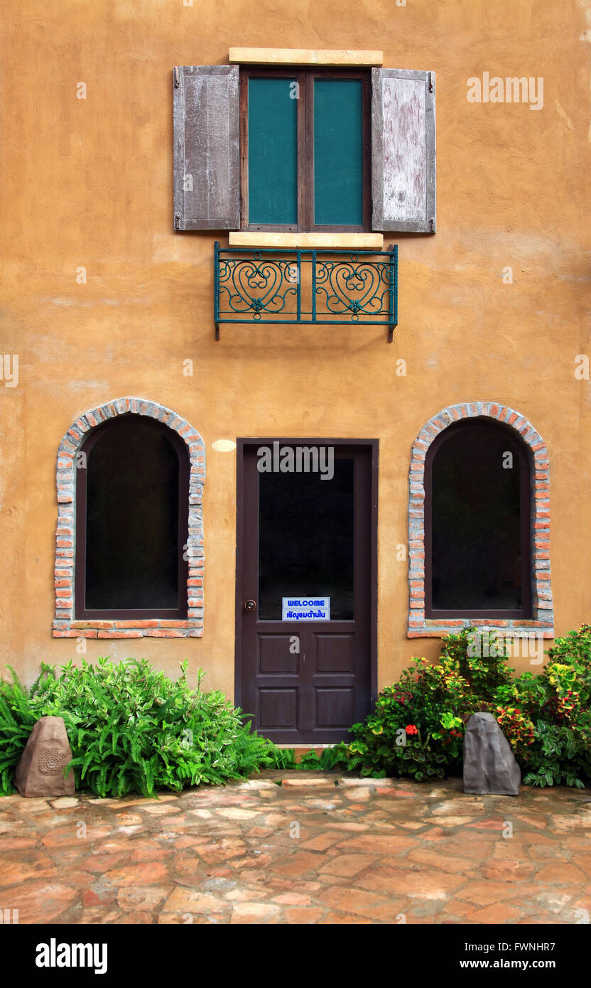 Italian style Window and Door of building with pavemwnt Stock Photo - Alamy