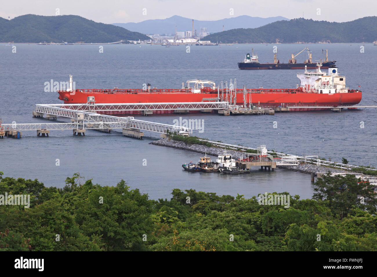 aerail view of Big red boat unloading cargo at dock pier Stock Photo ...