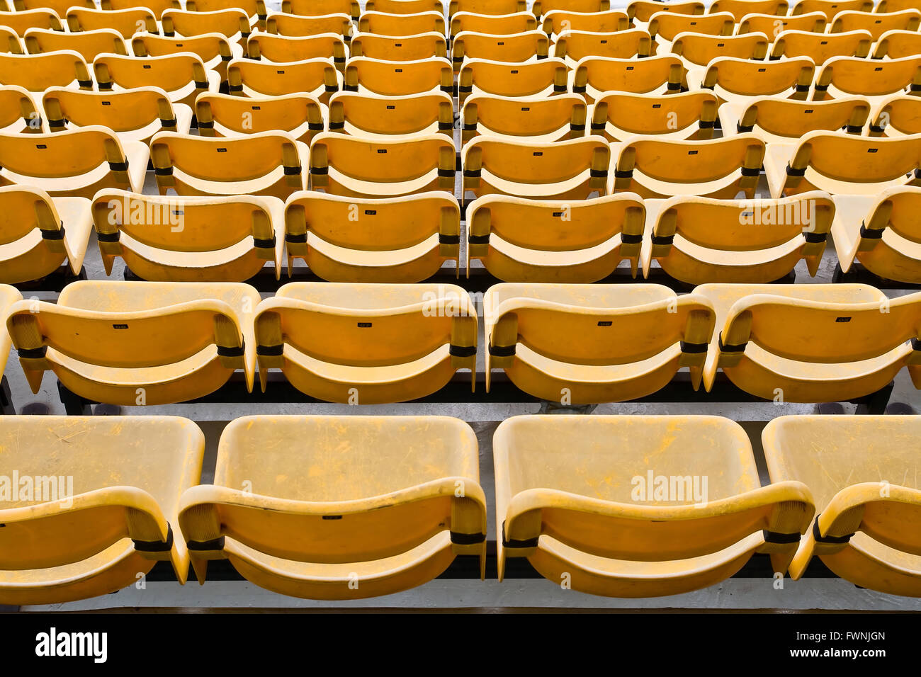 Yellow Seat Pattern in Football Stadium Stock Photo - Alamy