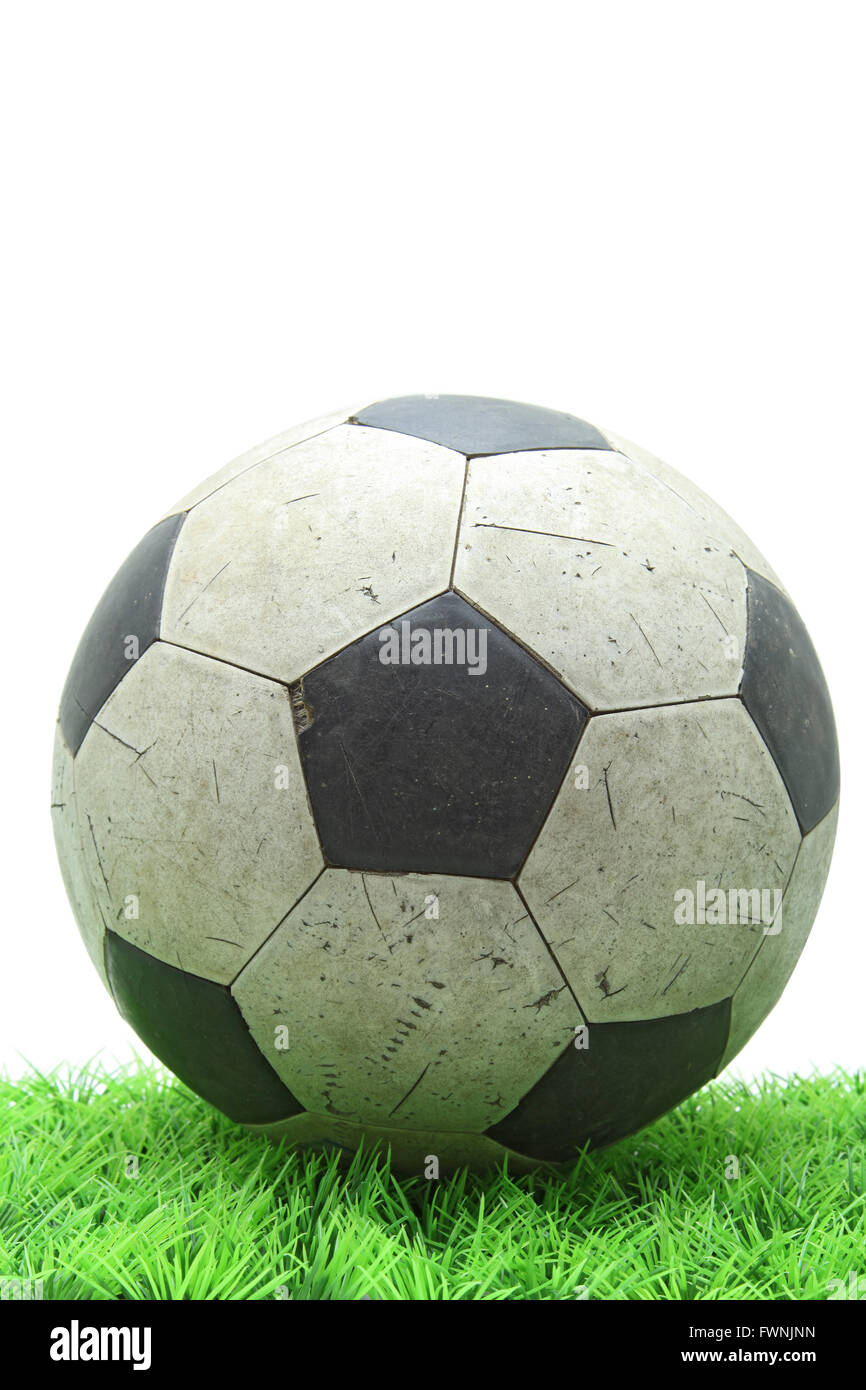 grunge soccer football on green grass Stock Photo - Alamy