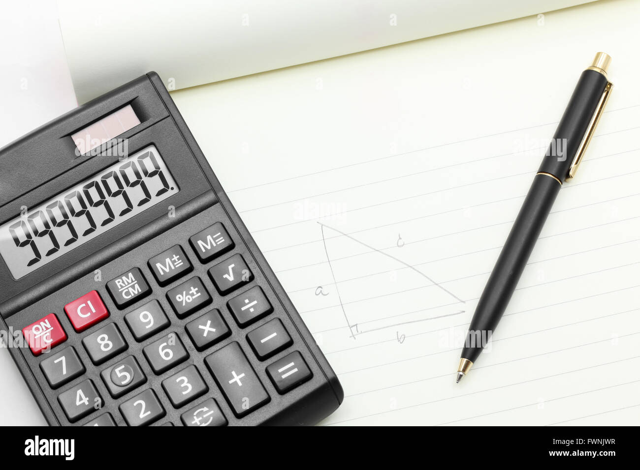 Perspective of black calculator and pen on memo book Stock Photo - Alamy